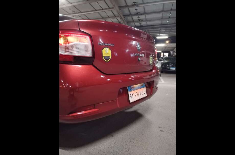 Logan Renault 2015 Agamy Dark red 6162101 - Car for sale : Hatla2ee