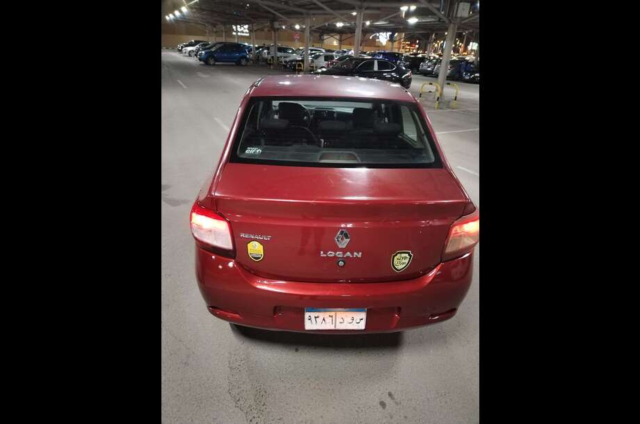 Logan Renault 2015 Agamy Dark red 6162101 - Car for sale : Hatla2ee