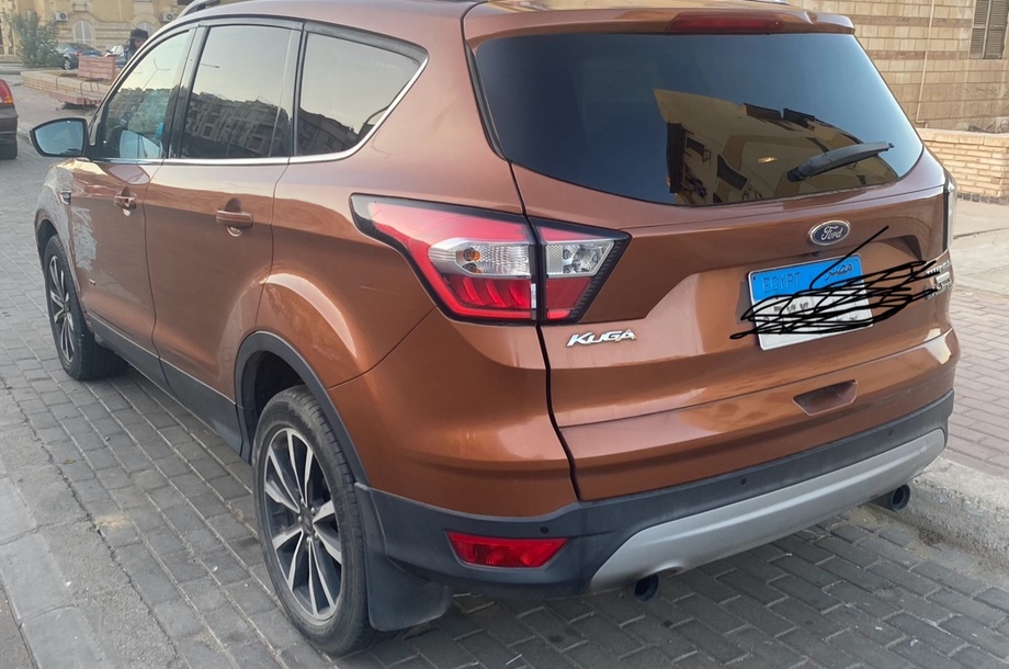 Kuga Ford 2018 Sheikh Zayed City Brown 6178229 - Car for sale : Hatla2ee