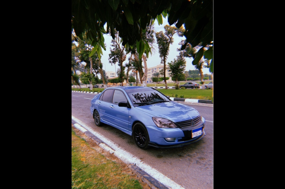 Lancer Puma Mitsubishi 2005 Ismailia Cyan 6183692 - Car for sale : Hatla2ee