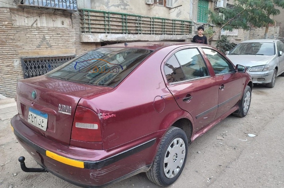 Octavia A4 Skoda 1998 Giza Dark red 6250868 - Car for sale : Hatla2ee