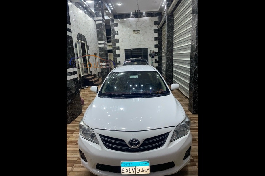 Corolla Toyota 2012 Zefta White 6305579 - Car for sale : Hatla2ee