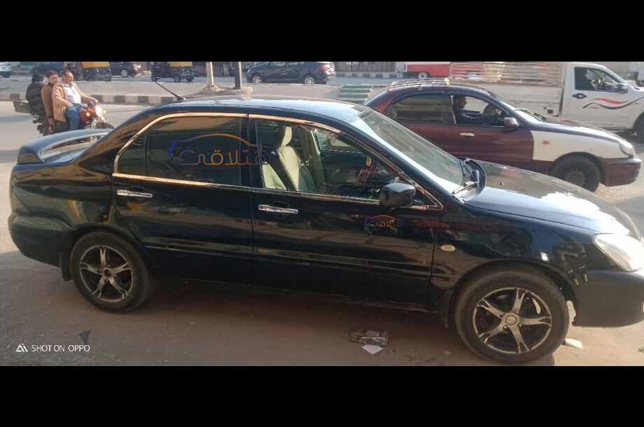 Lancer Puma Mitsubishi 2008 Zagazig Black 6307372 - Car for sale : Hatla2ee