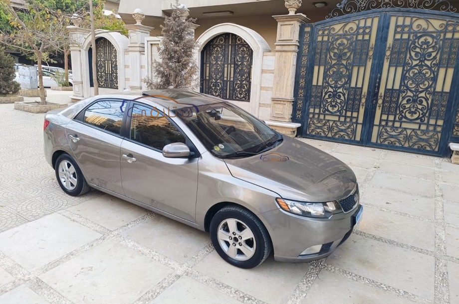 Forte Kia 2011 Nasr city Mocha 6311891 - Car for sale : Hatla2ee