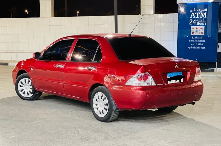 Lancer Puma Mitsubishi 2011 El Minya Red 6332056 - Car for sale : Hatla2ee