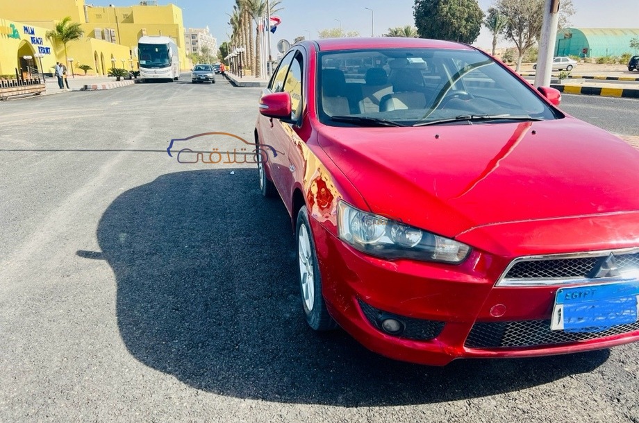 Lancer EX Shark Mitsubishi 2015 Banha Red 6335251 - Car for sale : Hatla2ee