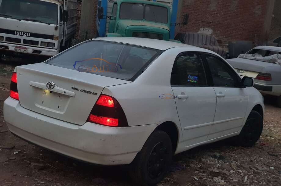 Corolla Toyota 2002 Tanta White 6336511 - Car for sale : Hatla2ee