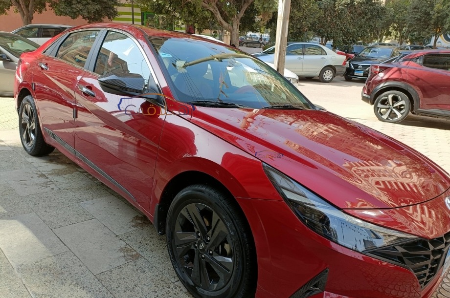 Elantra CN7 Hyundai 2021 Heliopolis Red 6341980 - Car for sale : Hatla2ee