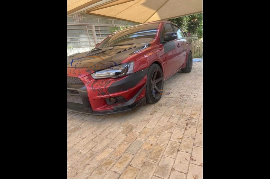 Lancer EX Shark Mitsubishi 2017 Cairo Red 6350423 - Car for sale : Hatla2ee