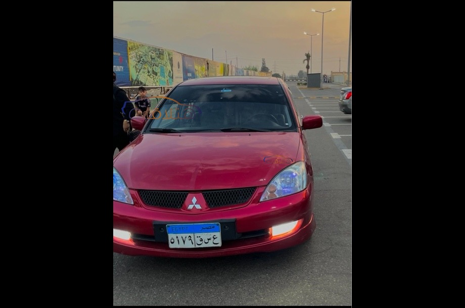 Lancer Puma Mitsubishi 2009 Gharbia Red 6357461 - Car for sale : Hatla2ee