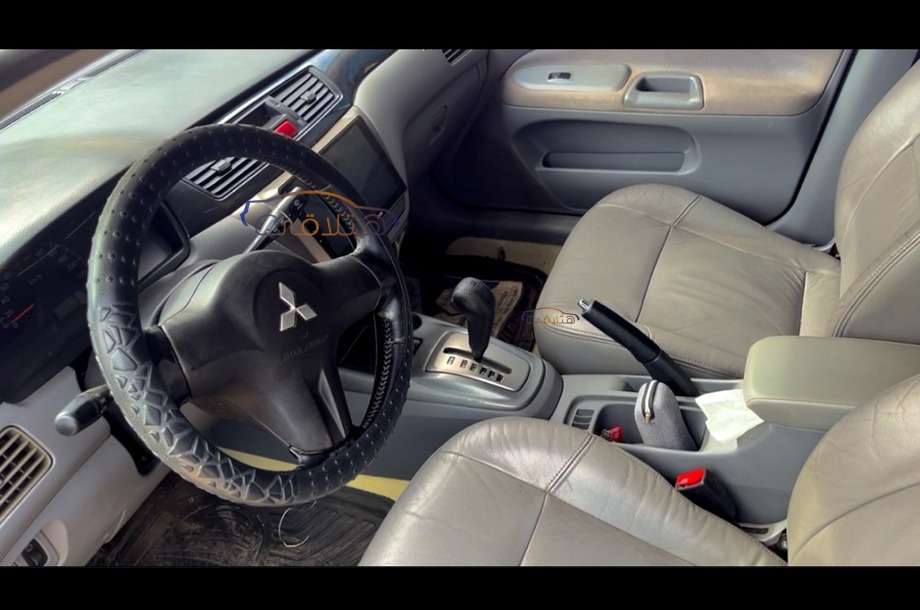 Lancer Puma Mitsubishi 2009 Gharbia Red 6357461 - Car for sale : Hatla2ee