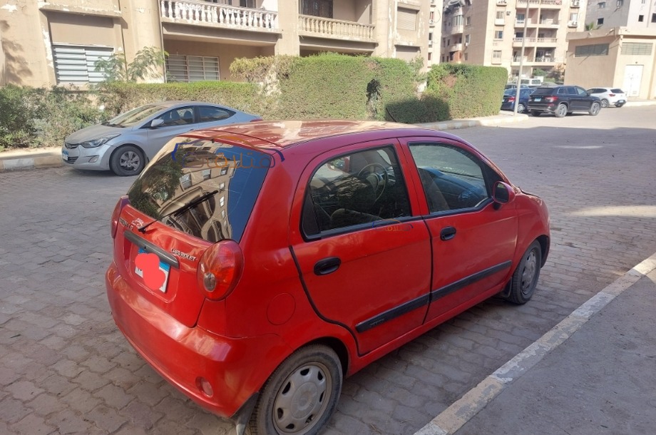 Spark Chevrolet 2010 6 October Red 6359870 - Car for sale : Hatla2ee