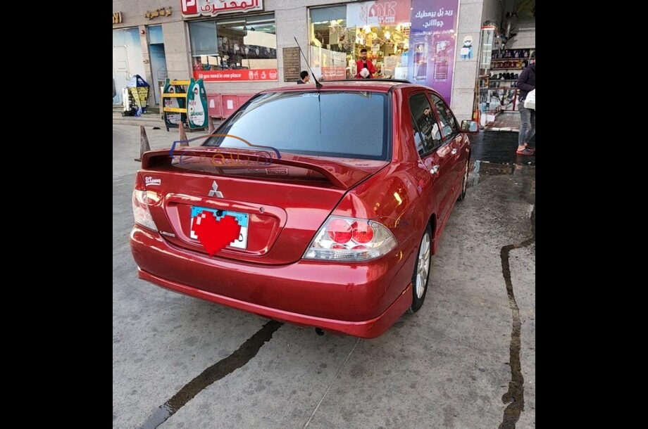 Lancer Puma Mitsubishi 2010 Mansoura Dark red 6362051 - Car for sale ...