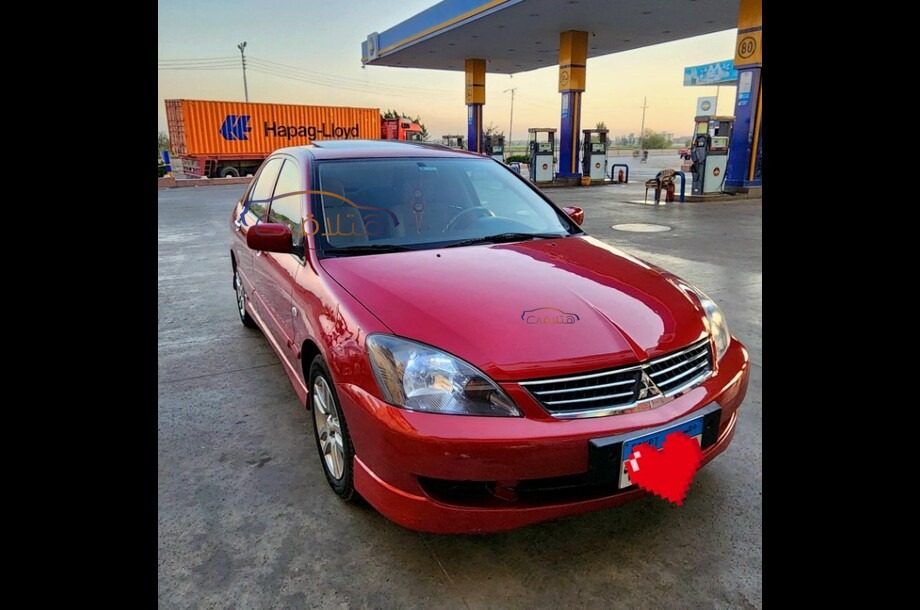 Lancer Puma Mitsubishi 2010 Mansoura Dark red 6362051 - Car for sale ...