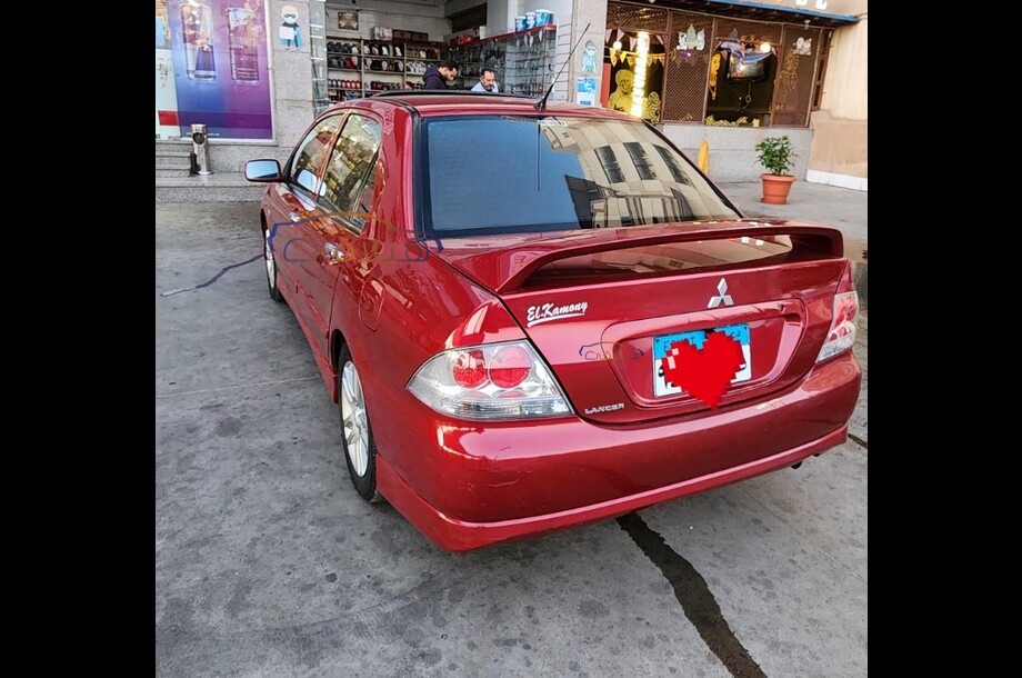Lancer Puma Mitsubishi 2010 Mansoura Dark red 6362051 - Car for sale ...