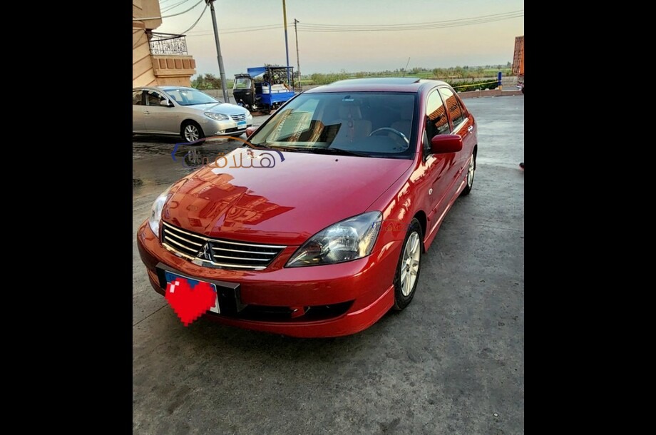 Lancer Puma Mitsubishi 2010 Mansoura Dark red 6362051 - Car for sale ...