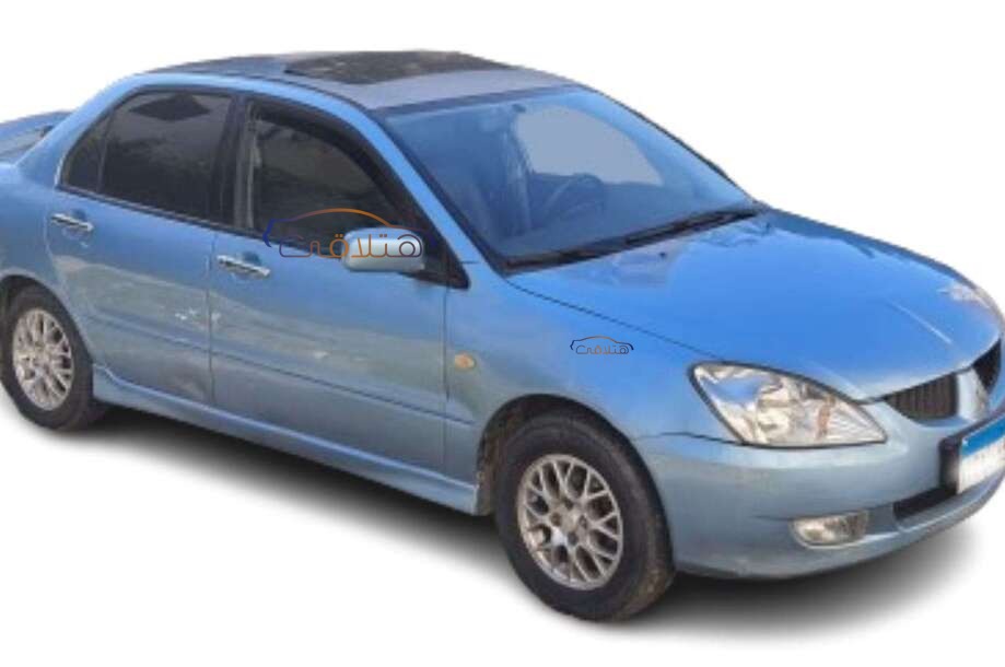 Lancer Puma Mitsubishi 2005 Mansoura Cyan 6370220 - Car for sale : Hatla2ee