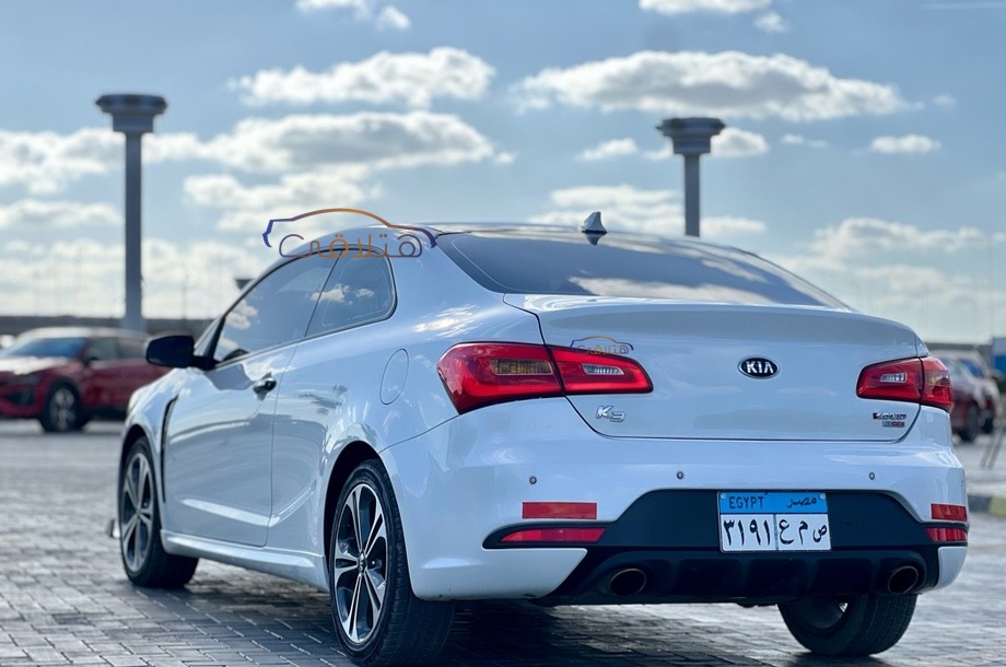 Cerato Koup Kia 2014 Alexandria White 6388586 - Car for sale : Hatla2ee