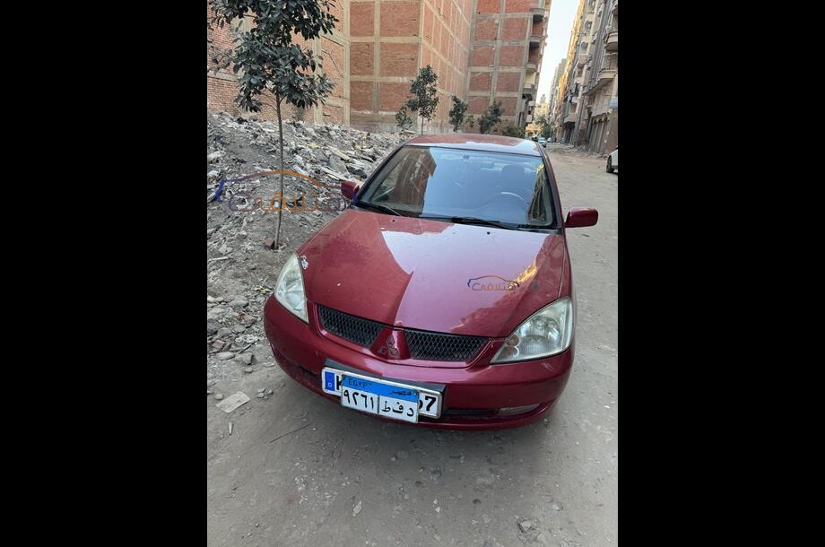 Lancer Puma Mitsubishi 2007 Mansoura Red 6389143 - Car for sale : Hatla2ee