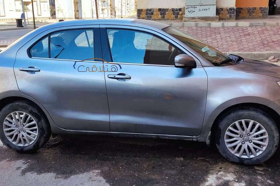Swift Dzire Suzuki 2022 Giza Silver 6397351 - Car for sale : Hatla2ee