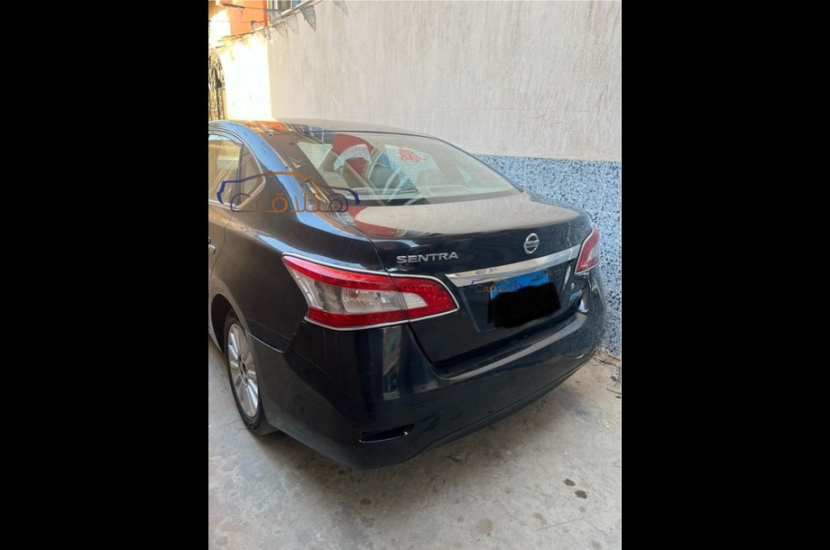 Sentra Nissan 2015 Giza Black 6404496 - Car for sale : Hatla2ee