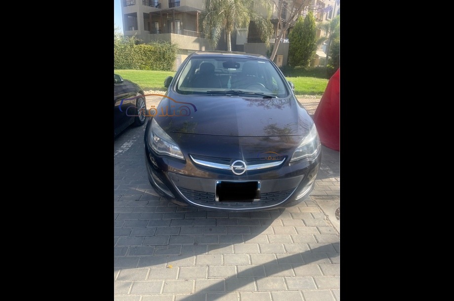 Astra Opel 2013 6 October Mocha 6417095 - Car for sale : Hatla2ee