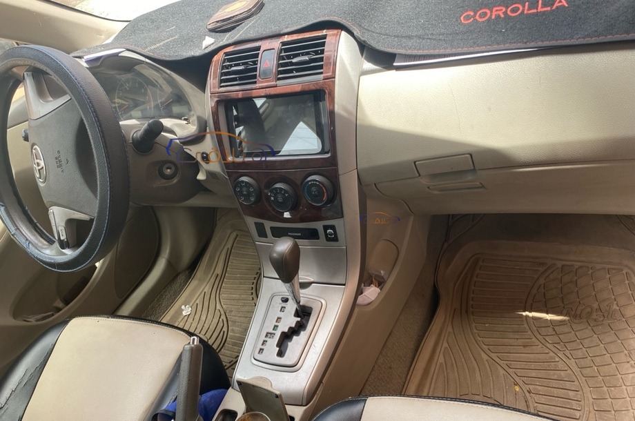 Corolla Toyota 2009 Ismailia White 6427458 - Car for sale : Hatla2ee