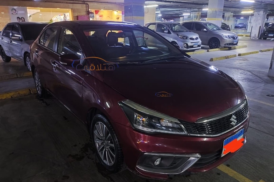 Ciaz Suzuki 2021 Nasr city Dark red 6427956 - Car for sale : Hatla2ee