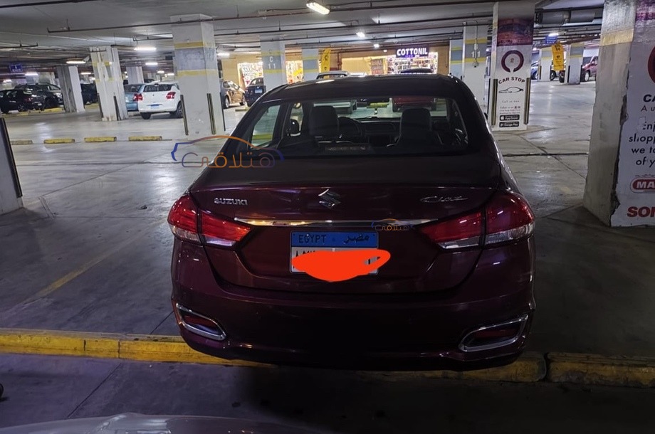Ciaz Suzuki 2021 Nasr city Dark red 6427956 - Car for sale : Hatla2ee