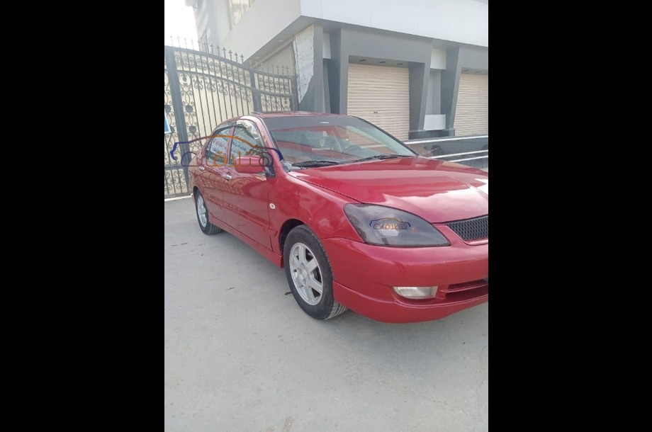 Lancer Puma Mitsubishi 2009 Cairo Red 6429471 - Car for sale : Hatla2ee