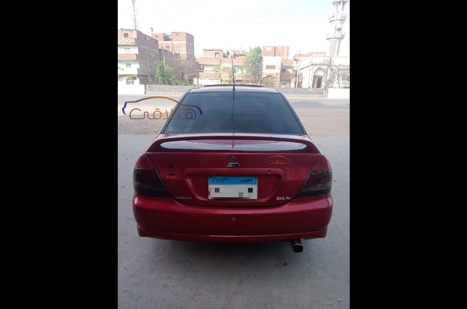 Lancer Puma Mitsubishi 2009 Cairo Red 6429471 - Car for sale : Hatla2ee