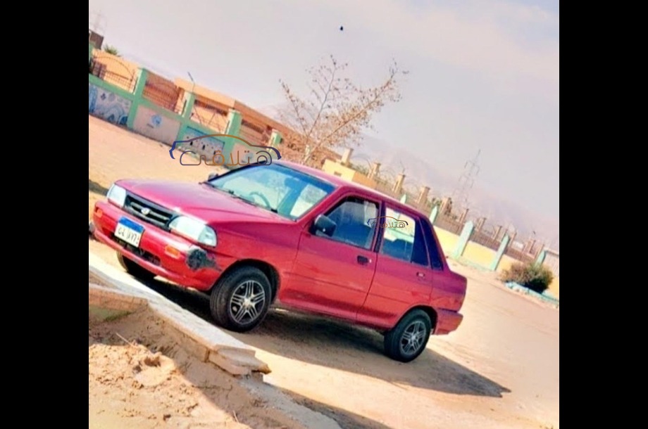 Pride Kia 2006 Imbaba Dark red 6435906 - Car for sale : Hatla2ee