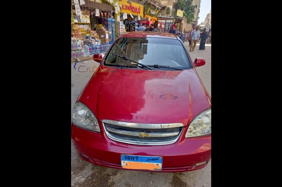 Optra Chevrolet 2011 El Haram Red 6448038 - Car for sale : Hatla2ee