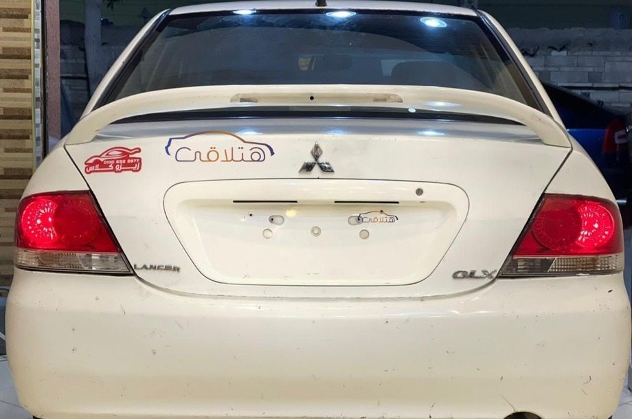 Lancer Puma Mitsubishi 2010 El Mahalla White 6451122 - Car for sale ...