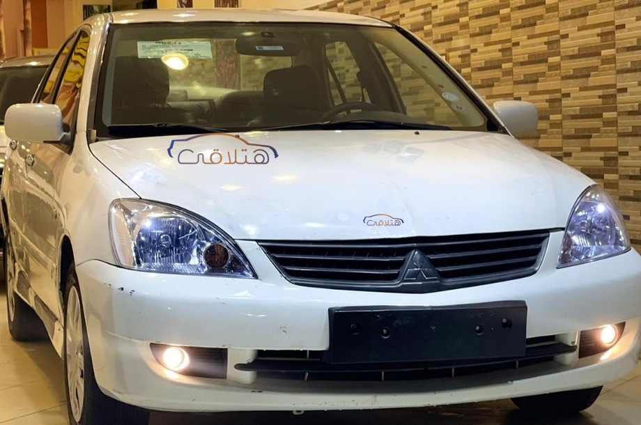 Lancer Puma Mitsubishi 2010 El Mahalla White 6451122 - Car for sale ...