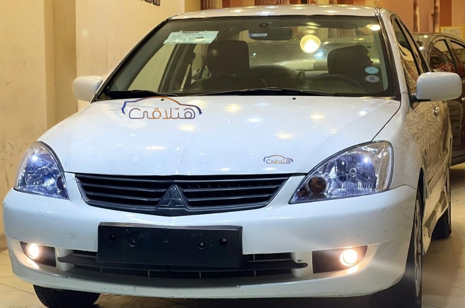 Lancer Puma Mitsubishi 2010 El Mahalla White 6451122 - Car for sale ...