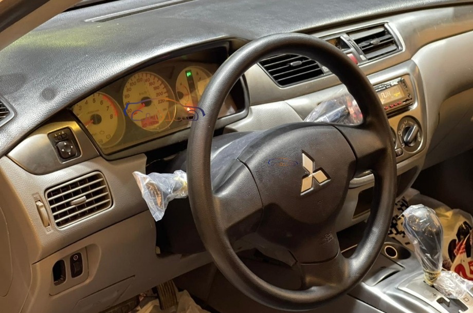 Lancer Puma Mitsubishi 2010 El Mahalla White 6451122 - Car for sale ...