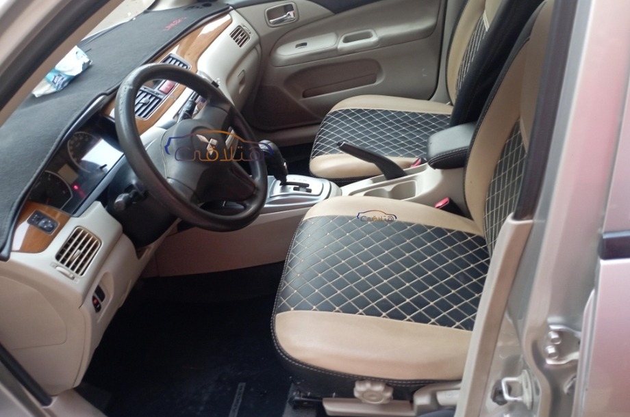 Lancer Puma Mitsubishi 2014 Tanta Silver 6454302 - Car for sale : Hatla2ee