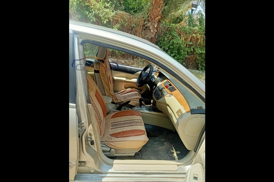 Lancer Puma Mitsubishi 2009 Cairo Silver 6458208 - Car for sale : Hatla2ee