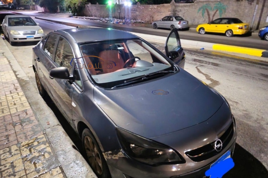 Astra Opel 2013 Alexandria Gray 6476032 - Car for sale : Hatla2ee