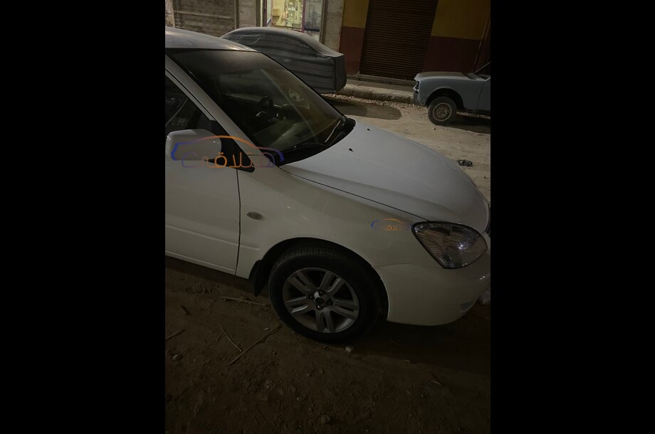 Lancer Puma Mitsubishi 2011 Giza White 6484167 - Car for sale : Hatla2ee