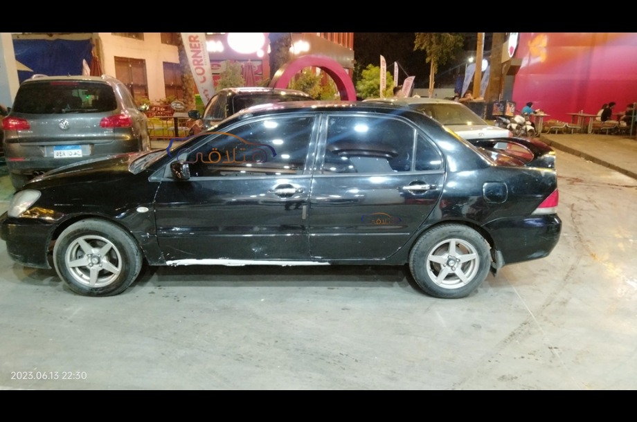 Lancer Puma Mitsubishi 2008 Giza Black 6484870 - Car for sale : Hatla2ee