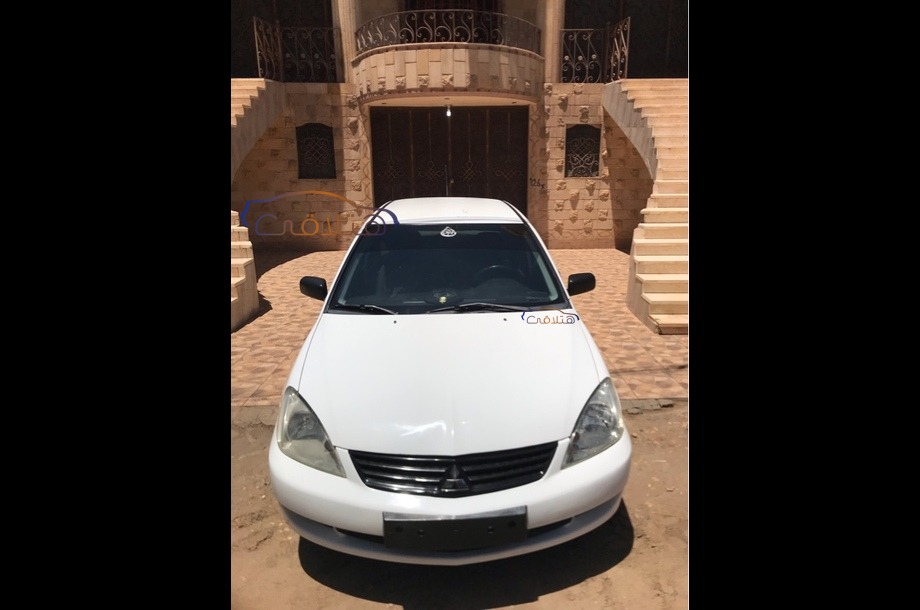 Lancer Puma Mitsubishi 2011 Dakahlia White 6491383 - Car for sale ...