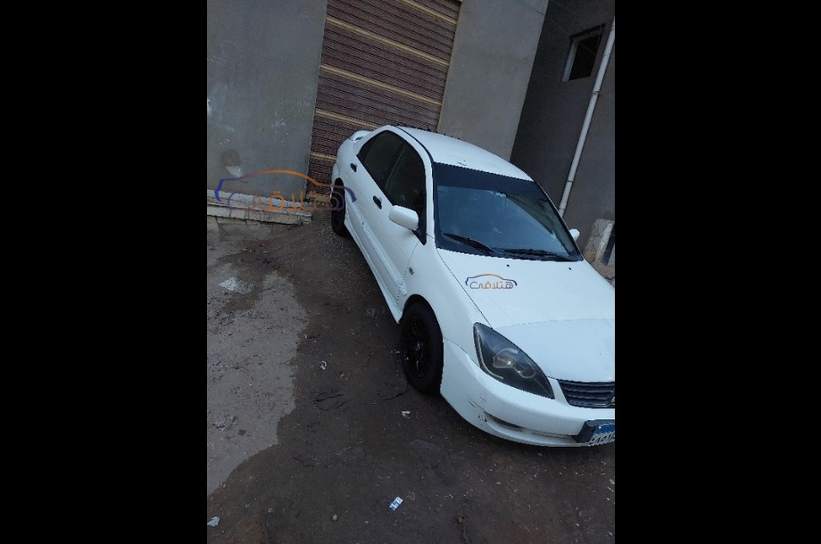 Lancer Puma Mitsubishi 2007 Dikirnis White 6501466 - Car for sale ...