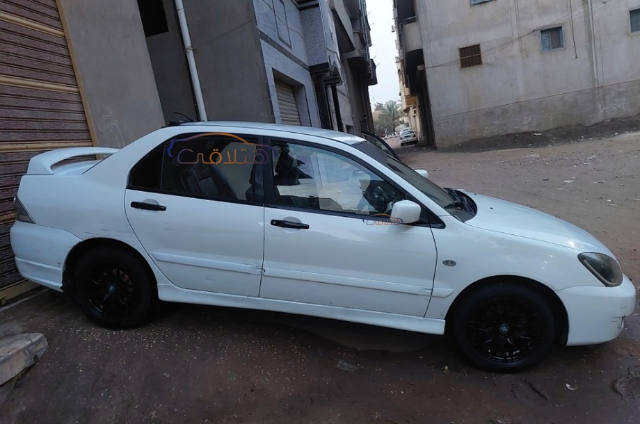 Lancer Puma Mitsubishi 2007 Dikirnis White 6501466 - Car for sale ...