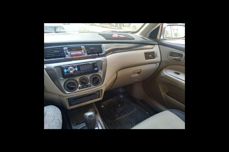 Lancer Puma Mitsubishi 2009 Luxor Silver 6503895 - Car for sale : Hatla2ee