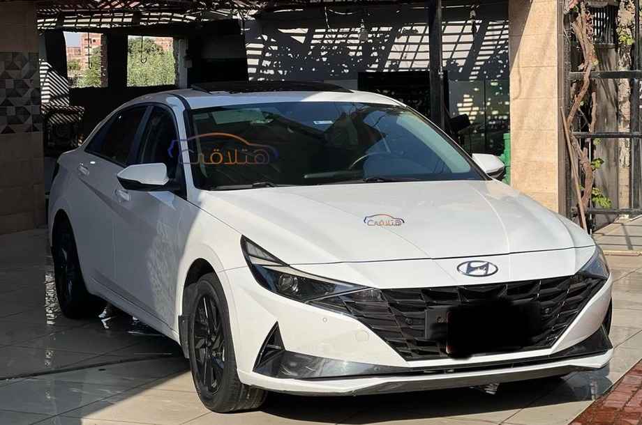 Elantra CN7 Hyundai 2021 Tanta White 6506709 - Car for sale : Hatla2ee