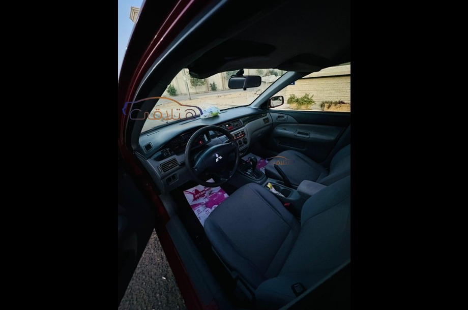 Lancer Puma Mitsubishi 2010 El Haram Red 6507079 - Car for sale : Hatla2ee