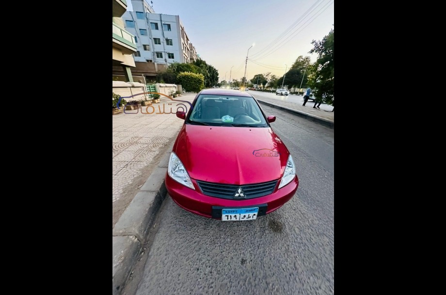 Lancer Puma Mitsubishi 2010 El Haram Red 6507079 - Car for sale : Hatla2ee