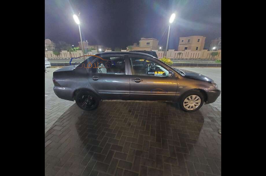 Lancer Puma Mitsubishi 2012 Cairo Silver 6514059 - Car for sale : Hatla2ee